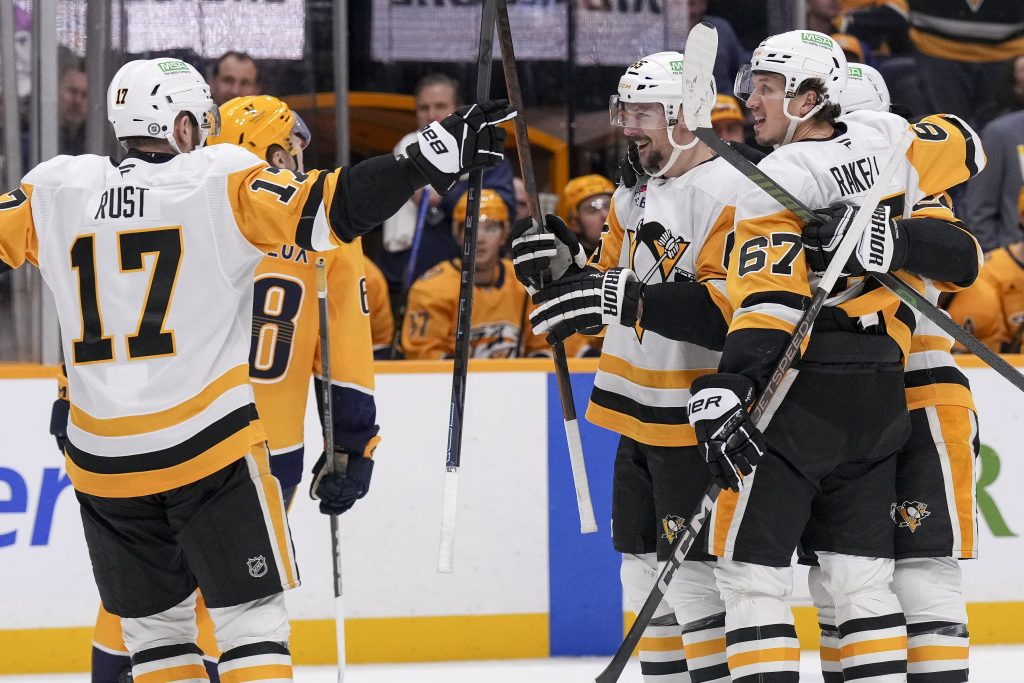 Rust scores twice, including OT winner, to lead Penguins over Predators ...